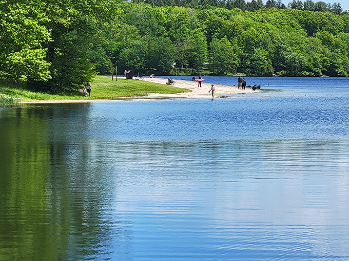 The perfect waterfall doesn't exi— Oh wait, it does! Promised Land's dam creates this mesmerizing cascade that's both soothing soundtrack and natural spectacle.