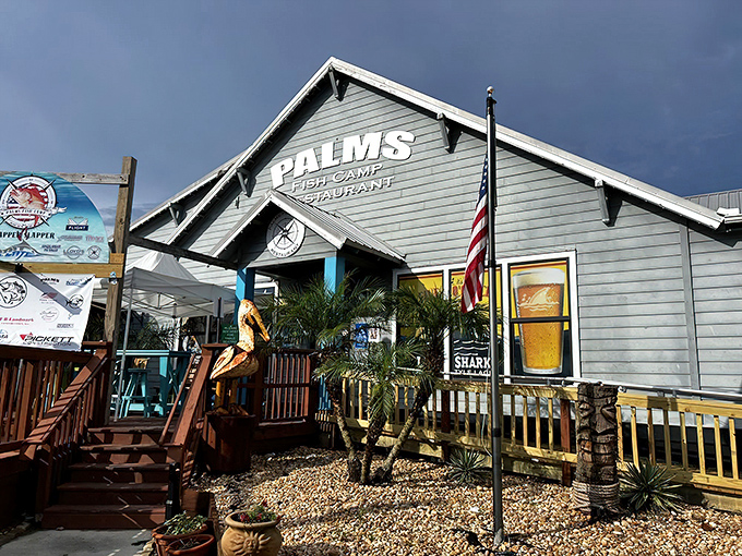 Old Florida charm at its finest! The seafoam green exterior and red stairs of Palms Fish Camp welcome you to a waterfront dining experience worth the drive.