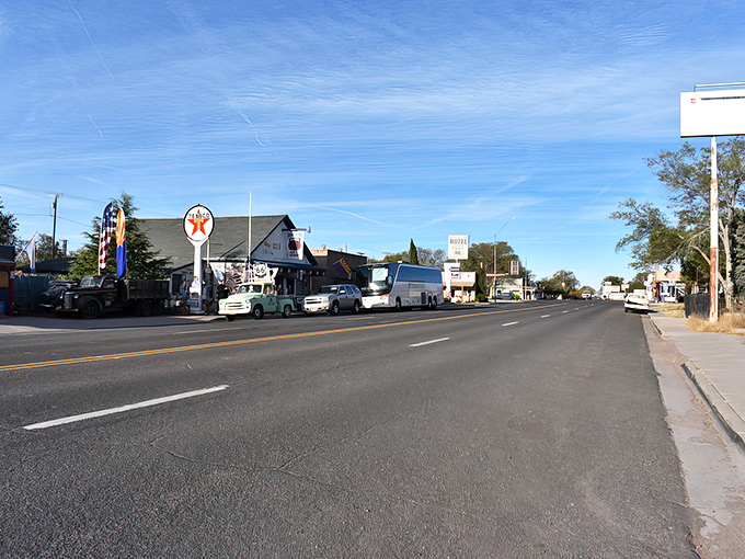 Main Street Seligman stretches before you like a living museum, where classic Americana meets desert sky in a perfect postcard of nostalgia.
