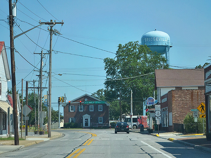 Downtown Bridgeville showcases its artistic soul with a vibrant mural that tells stories of community life against the backdrop of charming storefronts.