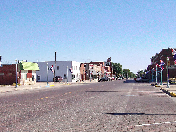 Webster Street stretches before you like a Norman Rockwell painting come to life, where brick buildings and blue skies create small-town perfection.