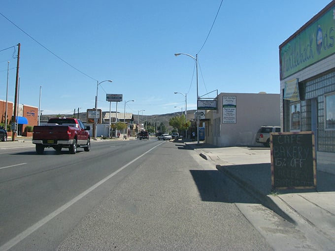 Main Street charm on full display with that impossibly blue New Mexico sky. Small-town America with a quirky twist and mountains as the backdrop.