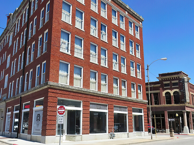 Downtown Pawhuska's historic brick buildings stand like sentinels of another era, their weathered facades telling stories of boom times, quiet decades, and remarkable revival.