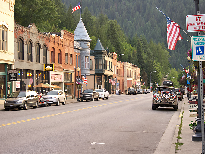 Main Street Wallace stretches toward pine-covered mountains like a Western movie set come to life. History and adventure await at every corner.