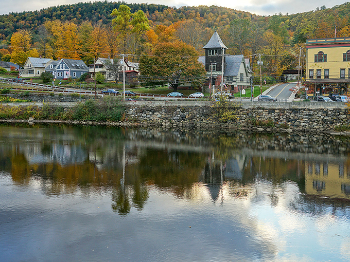 Autumn in Shelburne Falls paints the town in golden hues, creating a mirror image on the Deerfield River that's twice as nice.