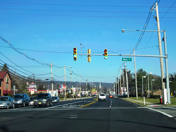 Main Street stretches before you like a Norman Rockwell painting come to life, where traffic lights are merely suggestions to slow down and notice the details.