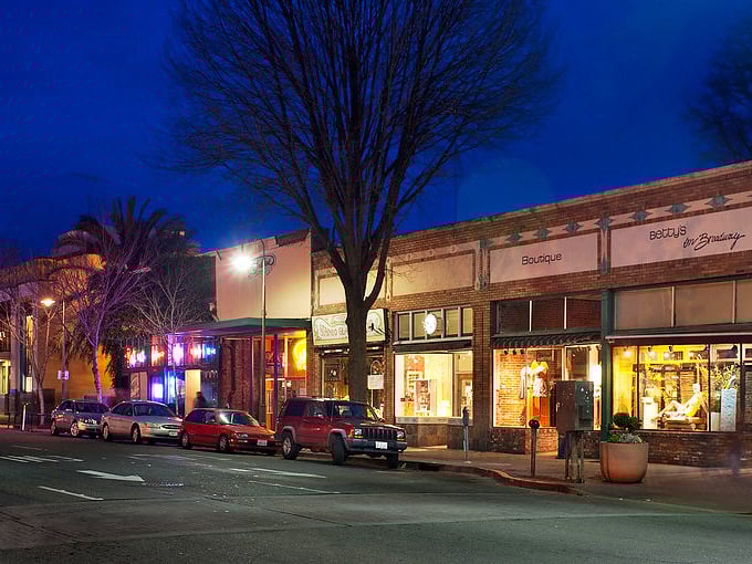 Downtown Chico's city plaza showcases architectural charm with its iconic arches and sculptures &ndash; a pocket of urban elegance surrounded by shady trees.