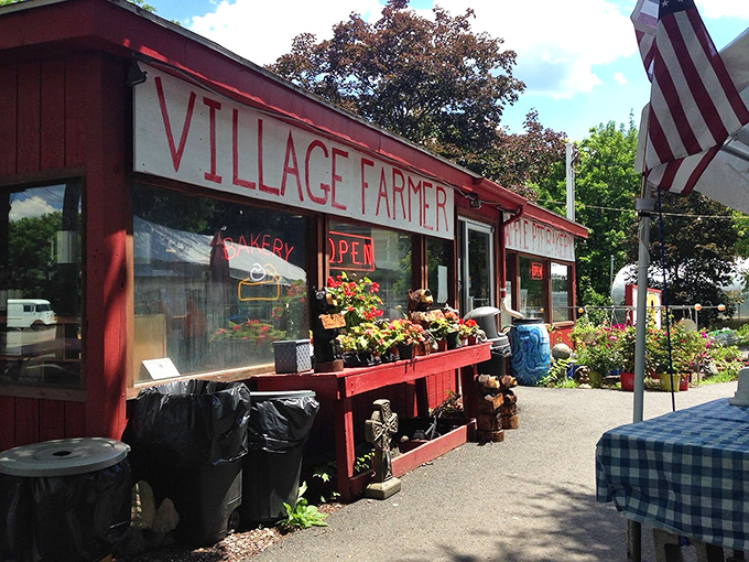 The red exterior of Village Farmer and Bakery stands like a beacon of carb-laden hope in Delaware Water Gap, promising sweet salvation to weary travelers.