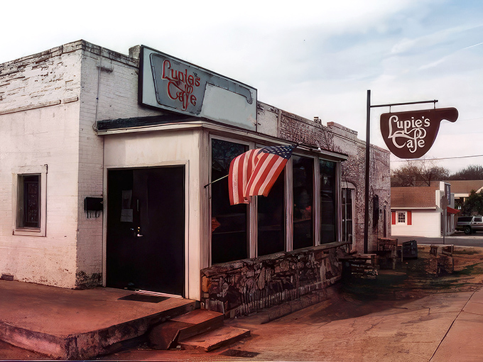The neon glow of Lupie's sign beckons like a lighthouse for the hungry soul. This unassuming exterior hides Charlotte's comfort food paradise.