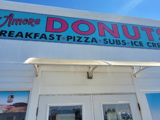 The unassuming white exterior of A'More Donuts hides culinary treasures within, like finding a Picasso at a yard sale.