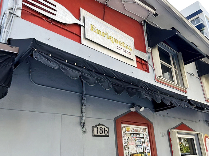 The unassuming red and white exterior of Enriqueta's might not scream "culinary landmark," but that line of hungry locals tells the real story.