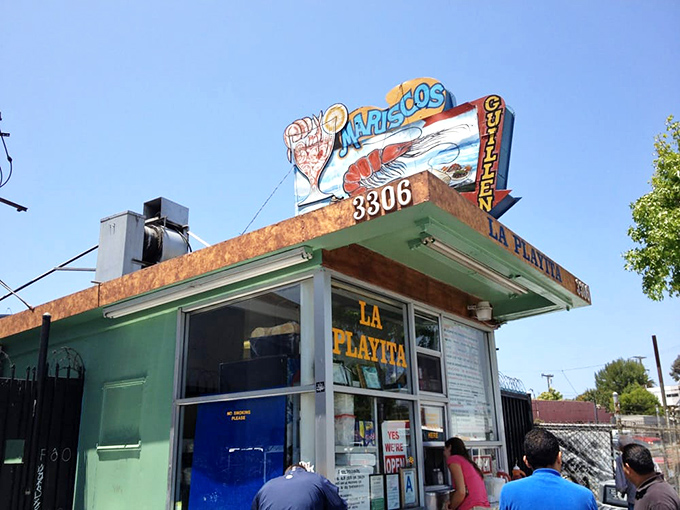 The humble orange facade of Mariscos Guillen La Playita stands like a seafood lighthouse on Lincoln Boulevard, beckoning hungry travelers with promises of oceanic treasures.