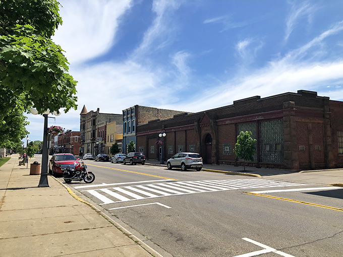 Historic storefronts standing shoulder to shoulder like old friends, Menominee's main street whispers stories of its lumber boom days.