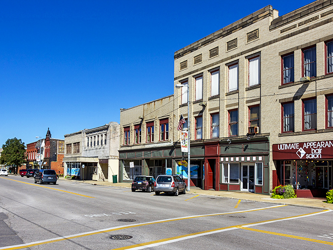 Main Avenue's historic buildings catch the golden hour sunlight, a scene that makes you wonder if Norman Rockwell moonlighted as a city planner.