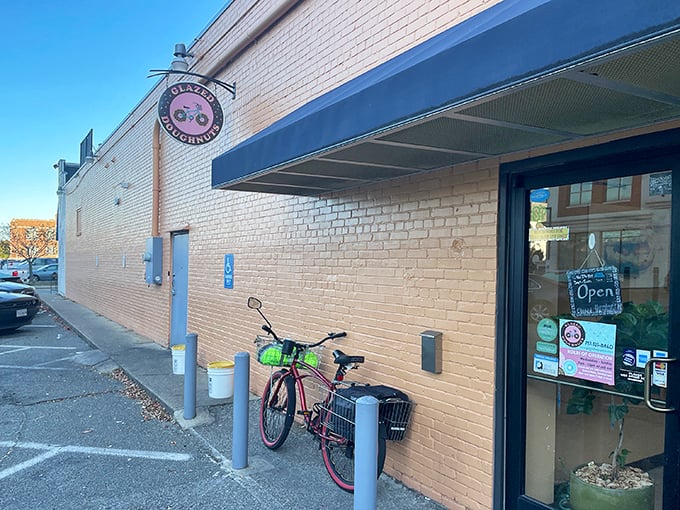 The unassuming exterior of Glazed Doughnuts in Hampton hides a world of pastry perfection. Sometimes the best treasures come in plain white packages.