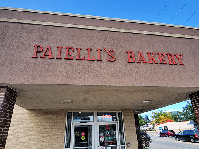 The pink exterior with bold red lettering isn't trying to impress anyone&mdash;it's too busy perfecting what's inside. Wisconsin's best-kept sweet secret awaits.