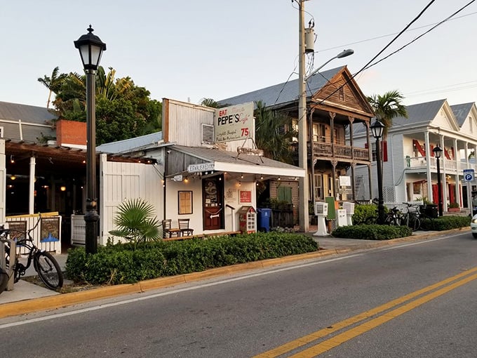 The white picket fence and vintage lamp post aren't just charming decor&mdash;they're time machines to Old Florida, where bicycles outnumber BMWs.