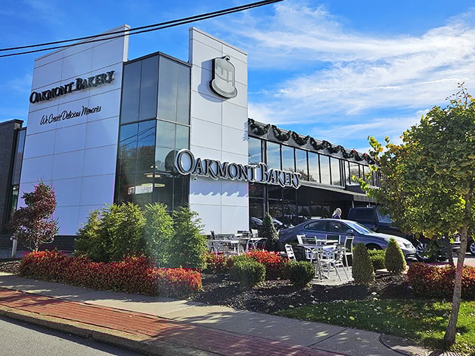 Oakmont Bakery's sleek, modern exterior stands like a temple to carbohydrates, complete with outdoor seating for those who can't wait to dive into their treasures.