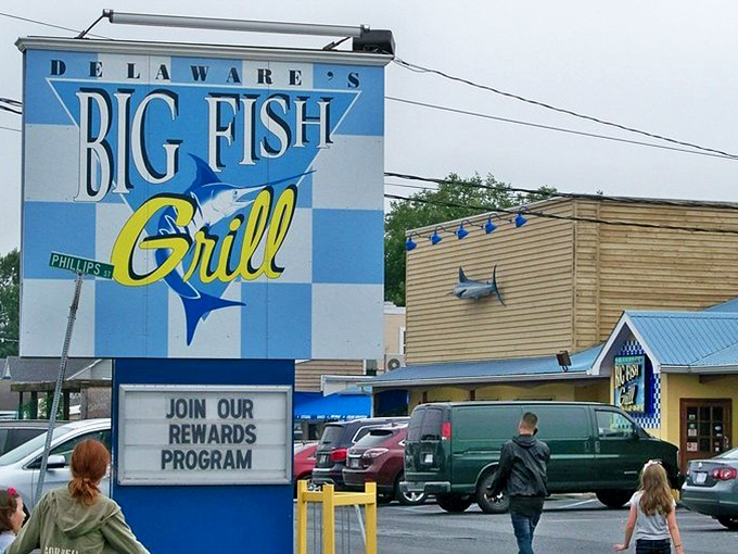 The iconic blue and white checkered sign welcomes hungry seafood lovers like a coastal lighthouse guiding you to flavor salvation.