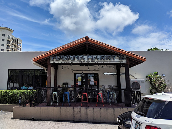 The terracotta-roofed entrance to Havana Harry's stands like a portal to Cuban culinary paradise, promising delicious adventures beyond its doors.
