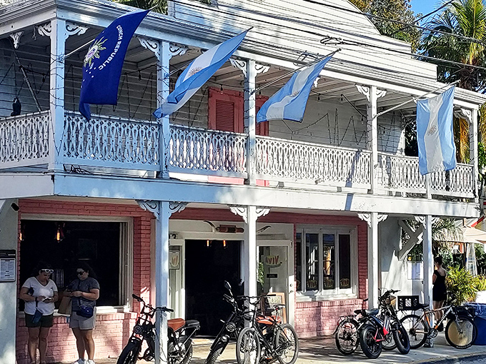 Classic Key West architecture meets Argentina as blue and white flags flutter above this charming building. Bicycles parked outside suggest the perfect island transportation method.