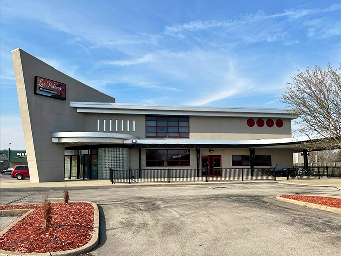 The distinctive mid-century modern architecture of Las Palmas stands out like a delicious anomaly in Champaign's landscape, promising culinary adventures within.