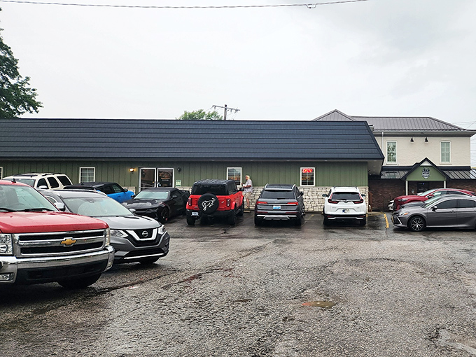 Don't let the modest green exterior fool you&mdash;this unassuming building houses fried chicken dreams that would make Colonel Sanders weep with envy.