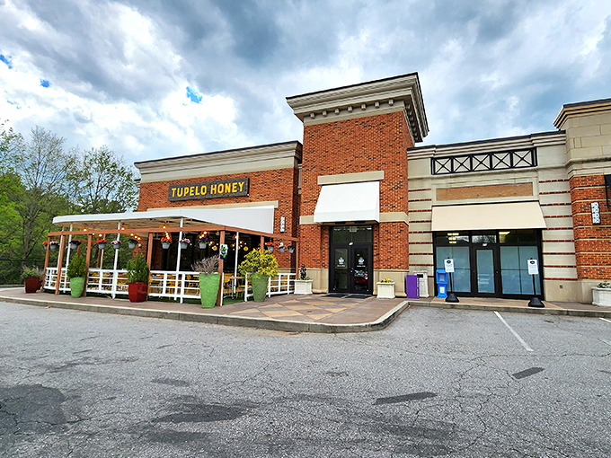 The brick exterior with its cheerful yellow signage feels like a warm Southern invitation you simply can't refuse.