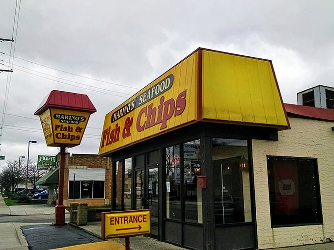 The bright yellow beacon of Marino's stands out like a culinary lighthouse, guiding hungry Columbus residents to seafood salvation regardless of weather.
