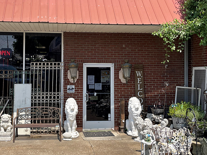 The unassuming exterior with its bold yellow "ANTIQUES" sign is like a treasure chest waiting to be opened. Adventure begins here!