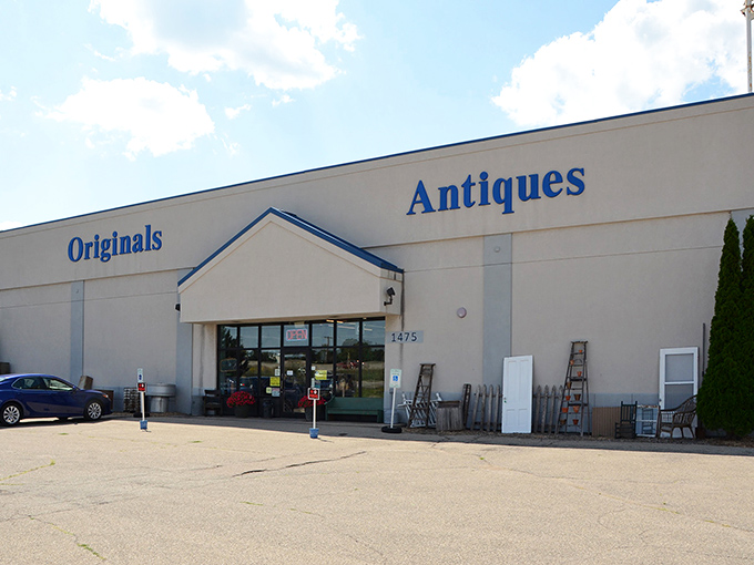 The unassuming exterior of Originals Mall of Antiques hides a wonderland of nostalgia inside, like finding a treasure chest disguised as a shoebox.