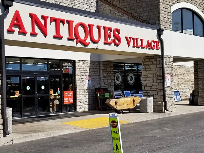 That red lettering practically shouts "treasure hunt ahead" &ndash; and the stone facade promises serious antiquing business inside.