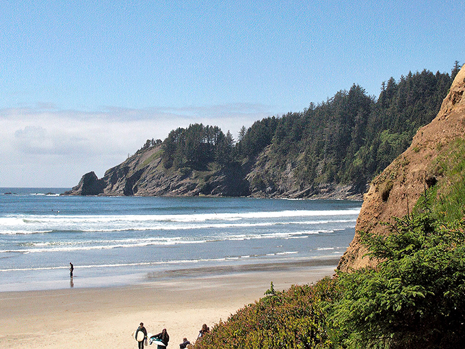 Nature's perfect amphitheater awaits at Short Sand Beach, where towering headlands cradle golden sands like they're protecting Oregon's best-kept secret.