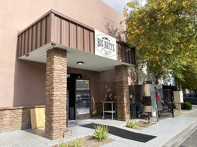 The unassuming entrance to Big Nate's Family BBQ in Mesa &ndash; where smoke signals from that side smoker are nature's most delicious invitation to come inside.