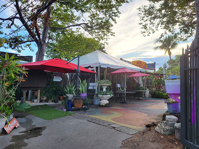 Welcome to paradise! La Mexicana's charming outdoor entrance, with its colorful umbrellas and lush greenery, promises a tropical escape from everyday life.