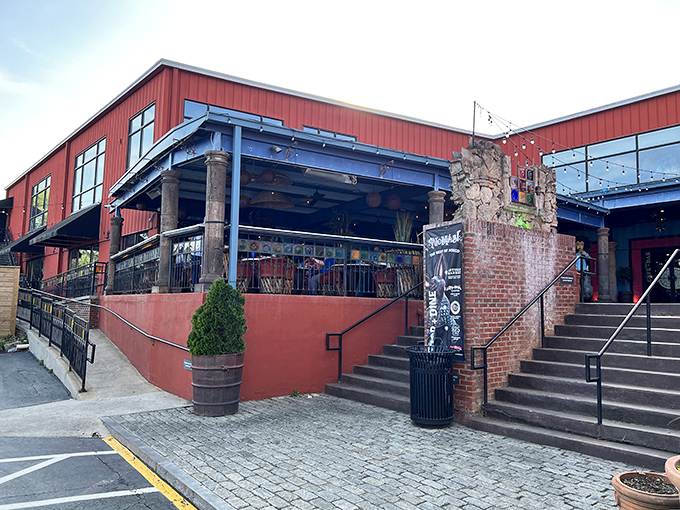 The striking red exterior of No Mas! Cantina beckons like a siren song for hungry souls wandering through Atlanta's Castleberry Hill district.