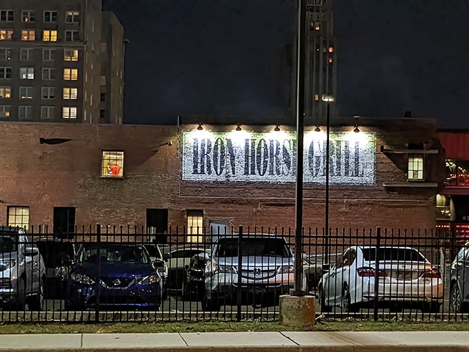 The Iron Horse Grill's illuminated sign transforms downtown Jackson's nightscape into a beacon for hungry adventurers seeking Southwestern salvation.