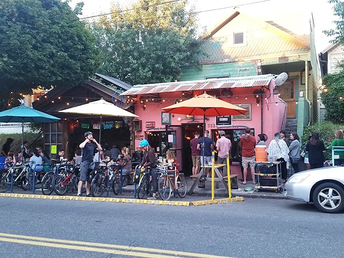 The pink facade of ¿Por Qué No? beckons like a tropical oasis in Portland, complete with string lights and a crowd that knows where the good stuff is.