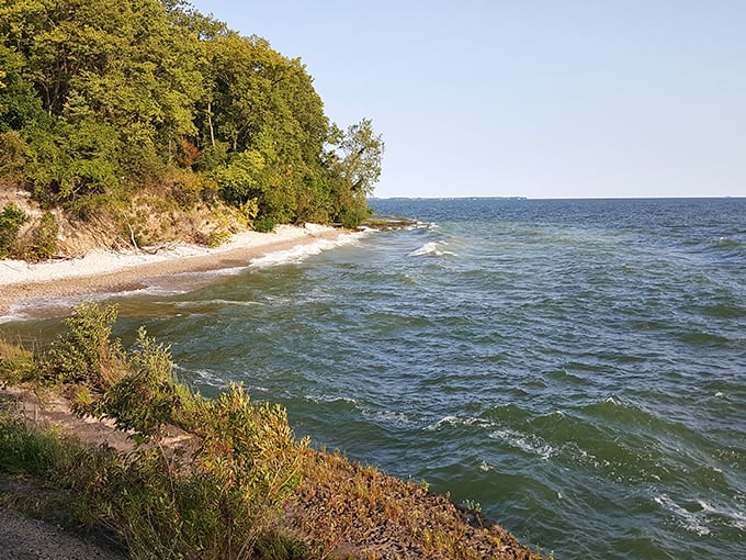 Nature's perfect balancing act: pristine shoreline meets crystal-clear Lake Erie waters along Kelleys Island's untouched beaches. Summer paradise found!
