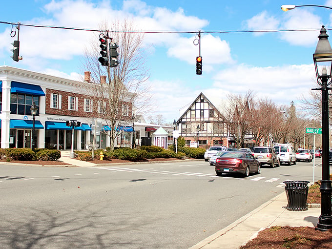 Main Street Ridgefield looks like a movie set where everyone got the memo about perfect New England charm. Those Tudor-style buildings aren't messing around.