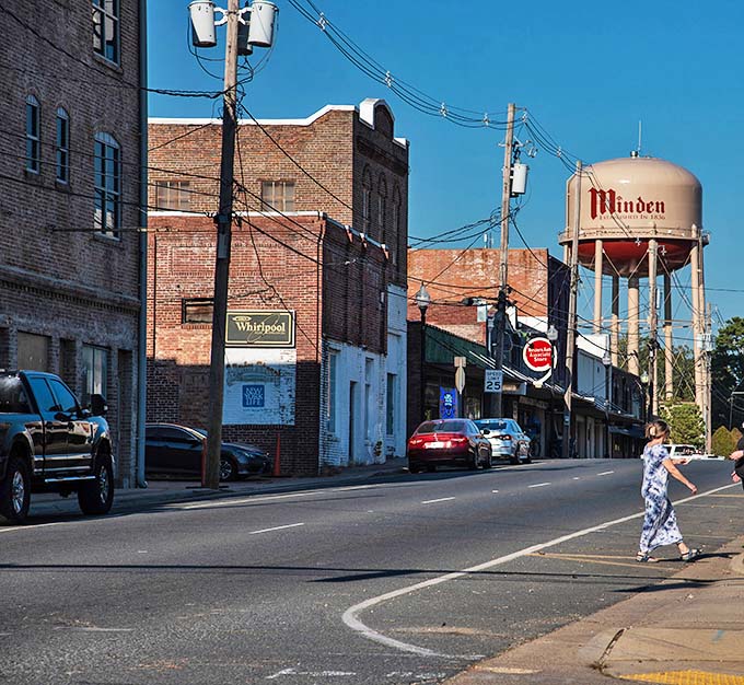 Minden's iconic water tower stands sentinel over brick-lined streets that whisper stories of Louisiana's past. Small-town charm with big personality.