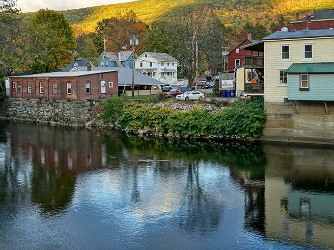 Autumn in Shelburne Falls paints the town in golden hues, creating a mirror image on the Deerfield River that's twice as nice.