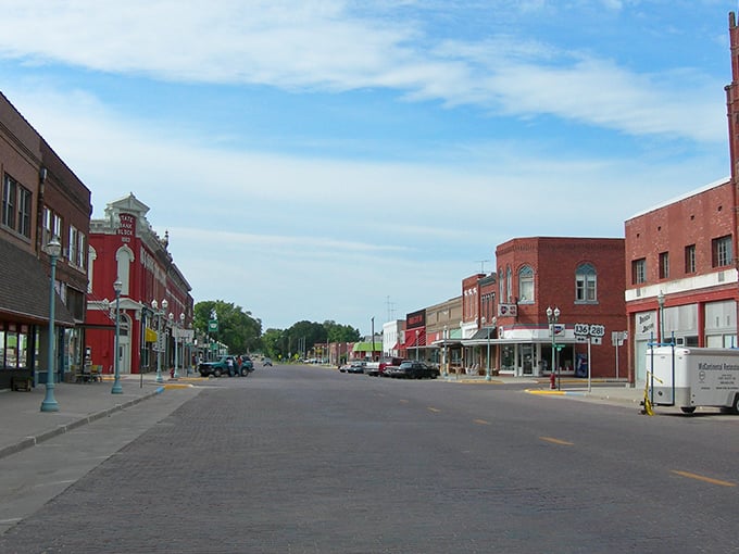 Webster Street stretches before you like a Norman Rockwell painting come to life, where brick buildings and blue skies create small-town perfection.