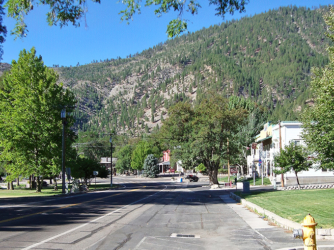 Genoa's main street offers a perfect postcard moment with the Sierra Nevada mountains creating a dramatic backdrop that changes with every season.