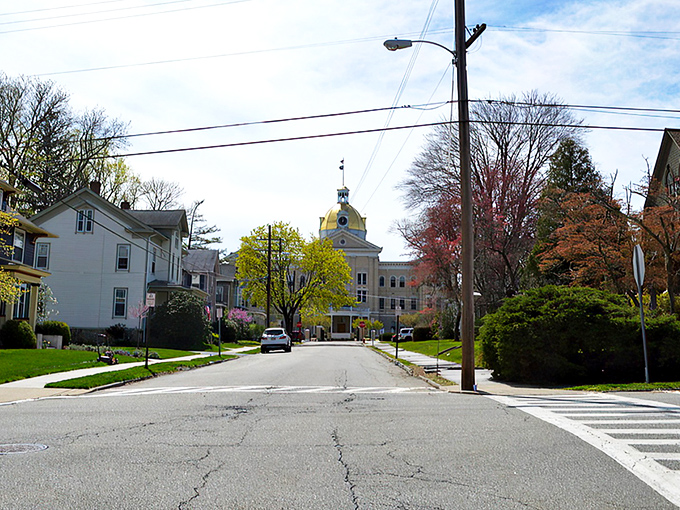 Main Street stretches before you like a Norman Rockwell painting come to life, where traffic lights are merely suggestions to slow down and notice the details.