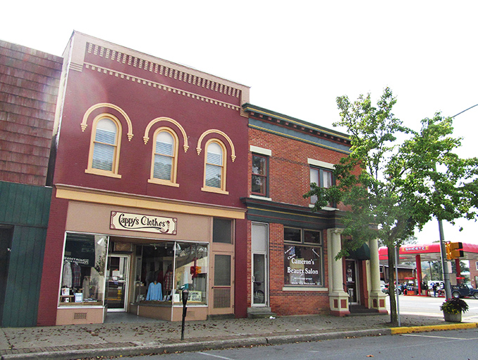 Historic brick storefronts line Emporium's main street, where Guppy's Clothes offers small-town retail therapy without big-city price tags.