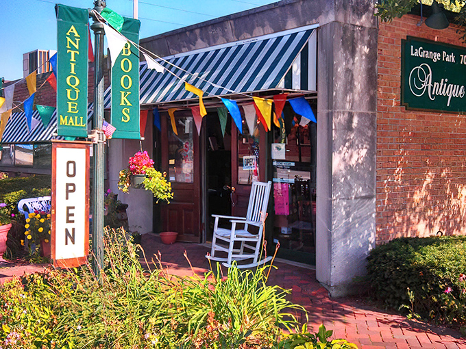 The classic brick facade and elegant green sign welcome treasure hunters to this suburban gem. History waits behind these walls.