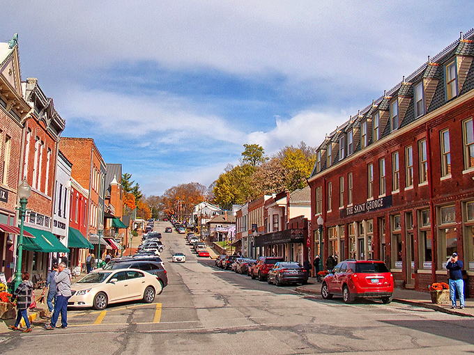 Main Street magic in full display. Weston's historic thoroughfare slopes gently upward, brick buildings standing sentinel to a simpler time that somehow still exists.