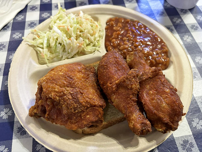 The classic three-piece meal with coleslaw and baked beans. This plate has launched a thousand food pilgrimages to Tennessee.