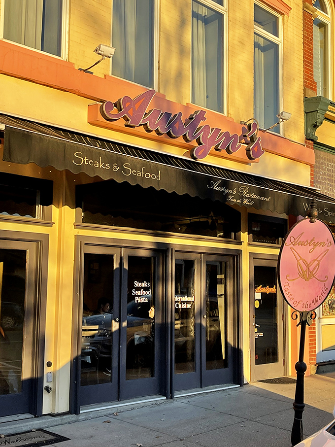 Austyn's golden facade catches the evening light like nature's Instagram filter &ndash; promising steaks, seafood, and zero pretentiousness inside.